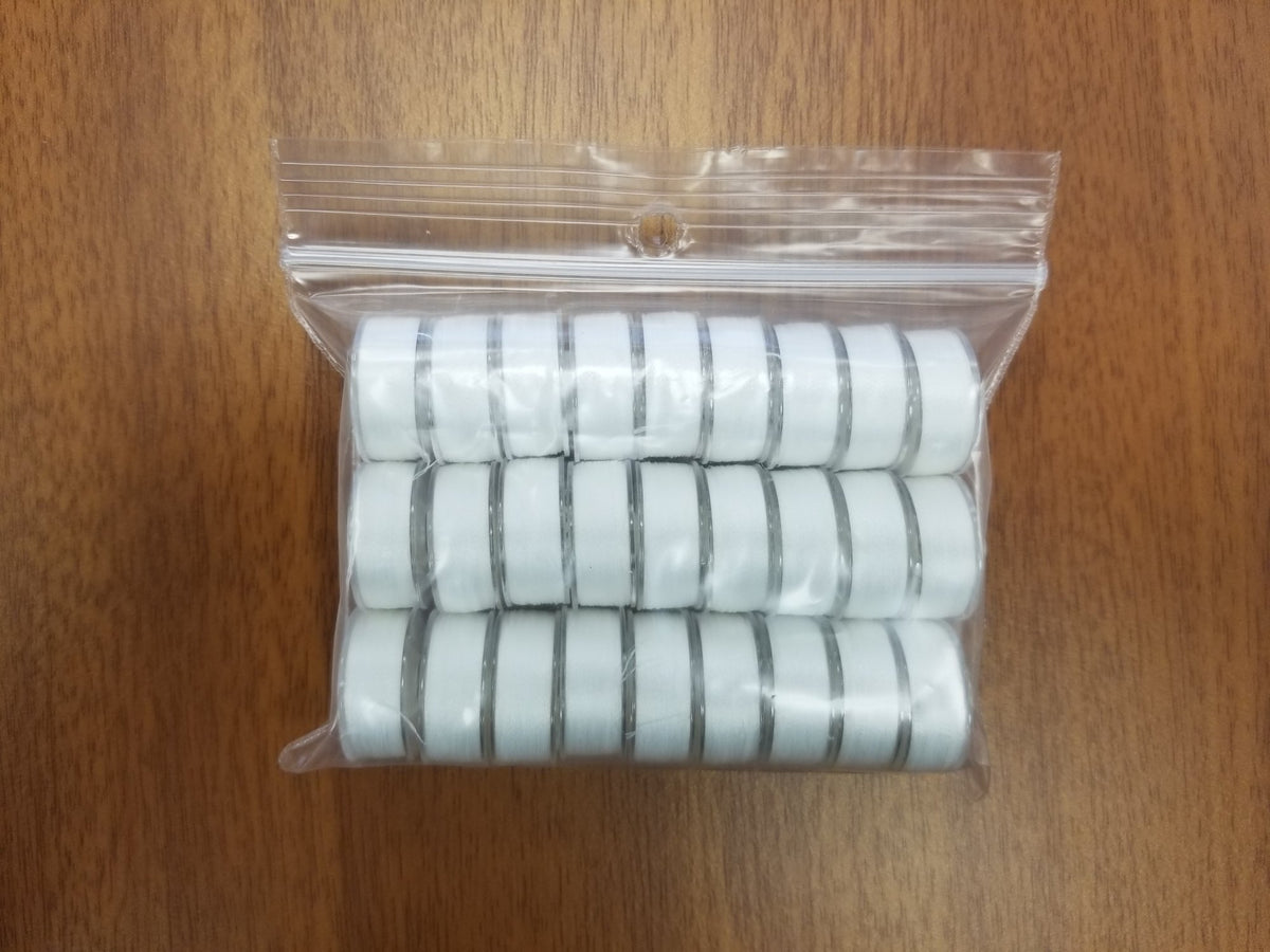 Prewound Class L Bobbins - White — Barnes Sewing Center